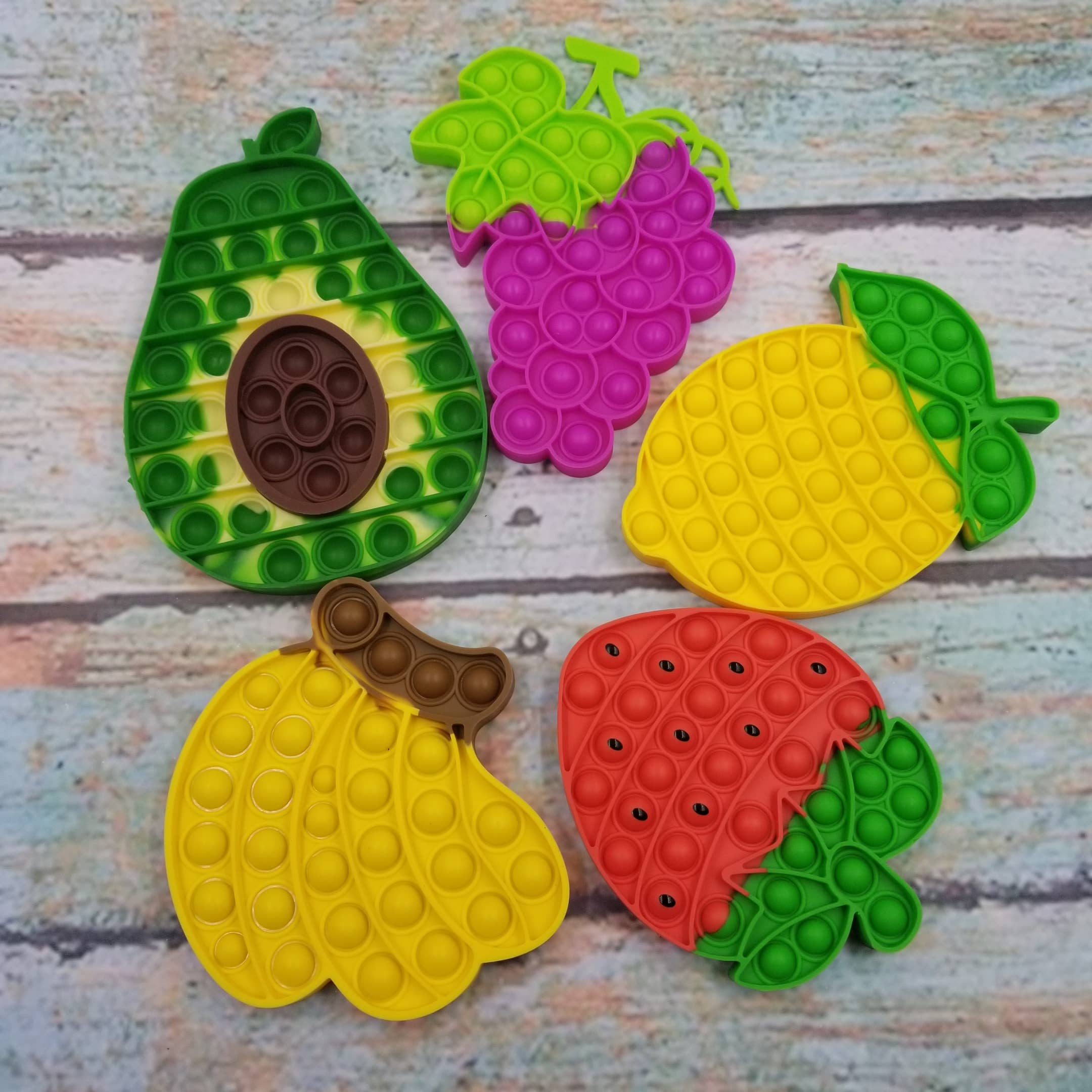 Purchase Wholesale fruit fidgets. Free Returns & Net 60 Terms on Faire