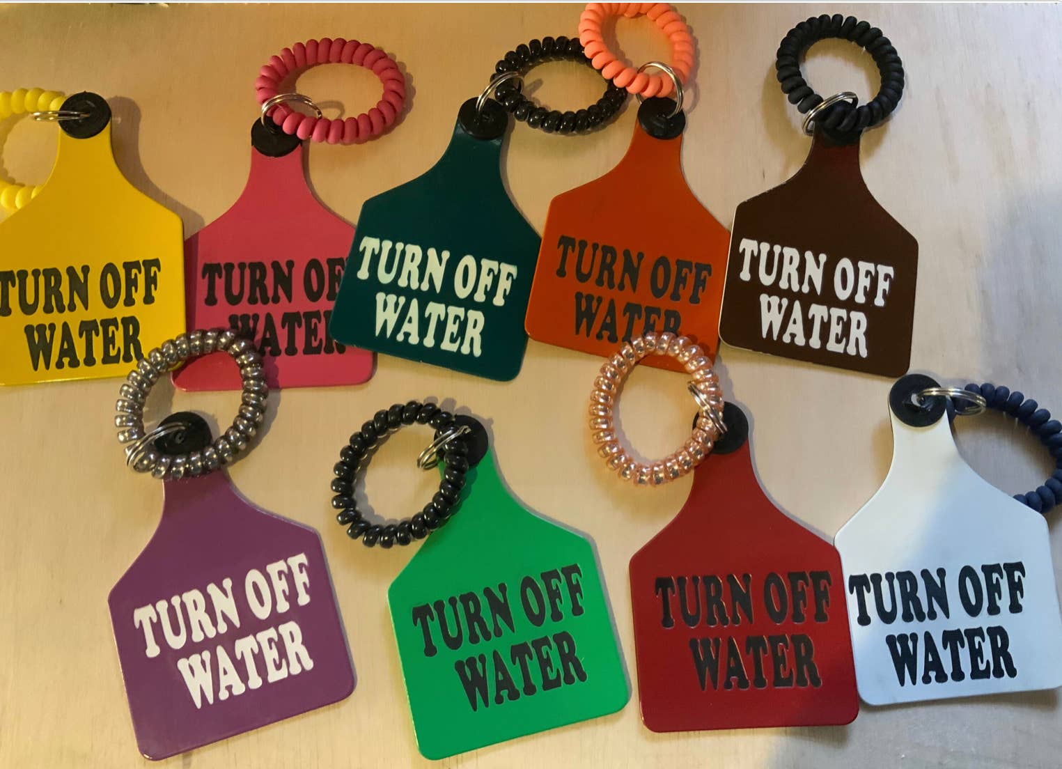 Wholesale TURN THE WATER OFF KEYCHAINS for your store - Faire
