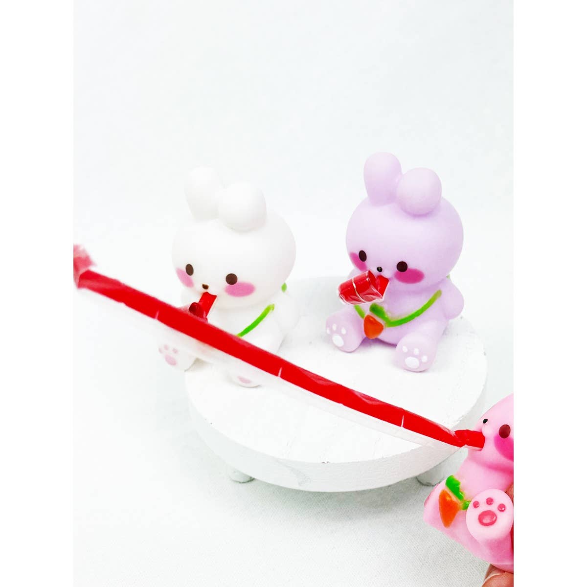 Wholesale Cute Bunny Roll Up Tongue Squeeze Toy for your store - Faire