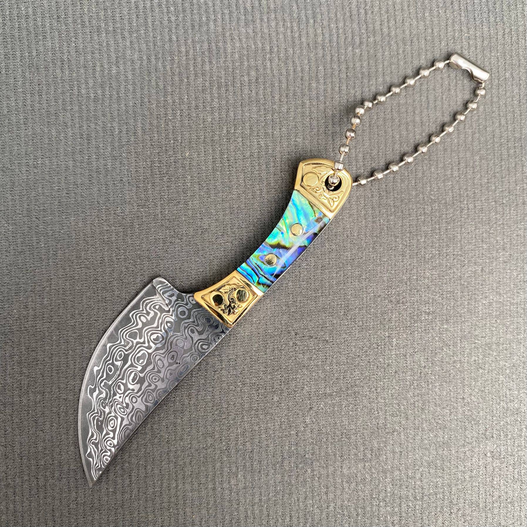 Wholesale Textured Mini Knife with Protective Cover for your store - Faire