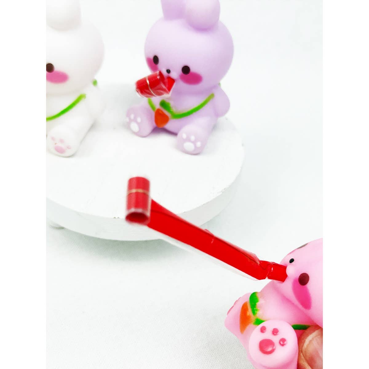Wholesale Cute Bunny Roll Up Tongue Squeeze Toy for your store - Faire