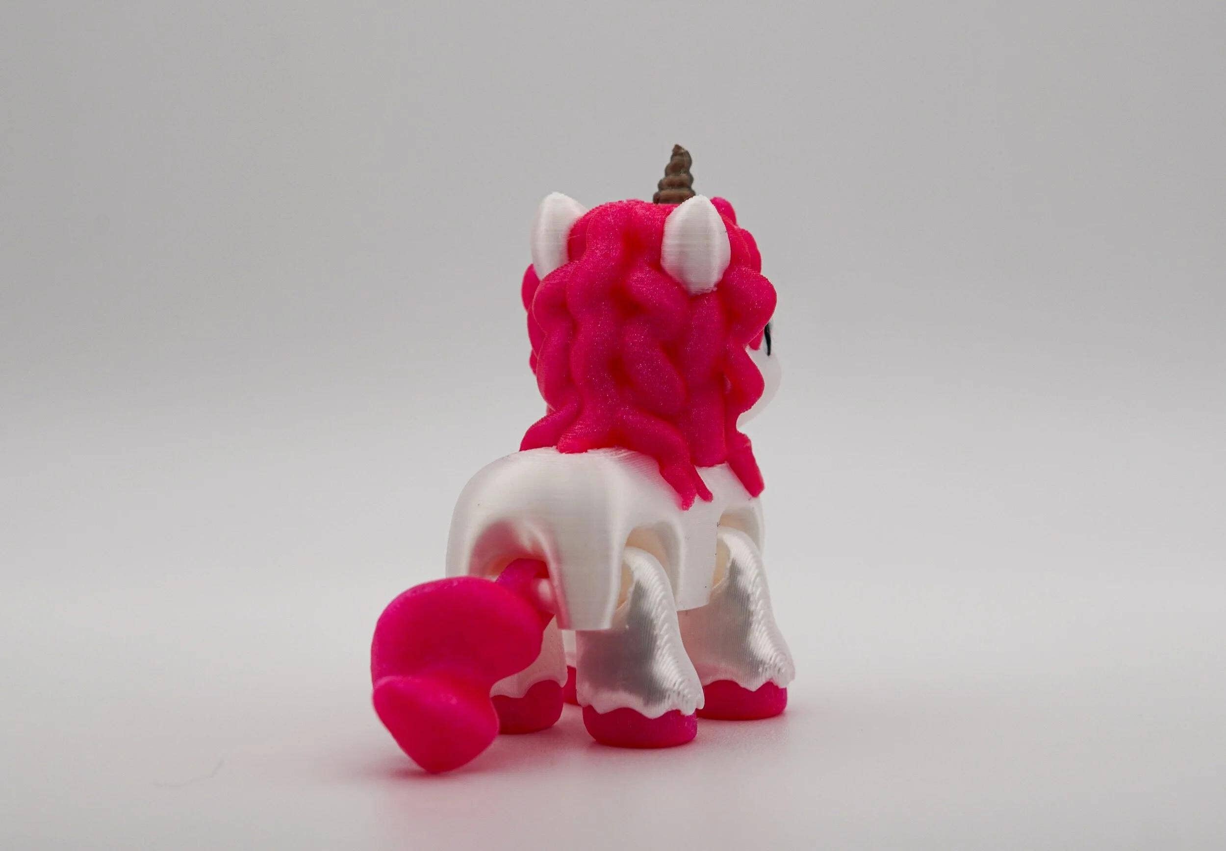 Wholesale Articulated Unicorn for your store - Faire