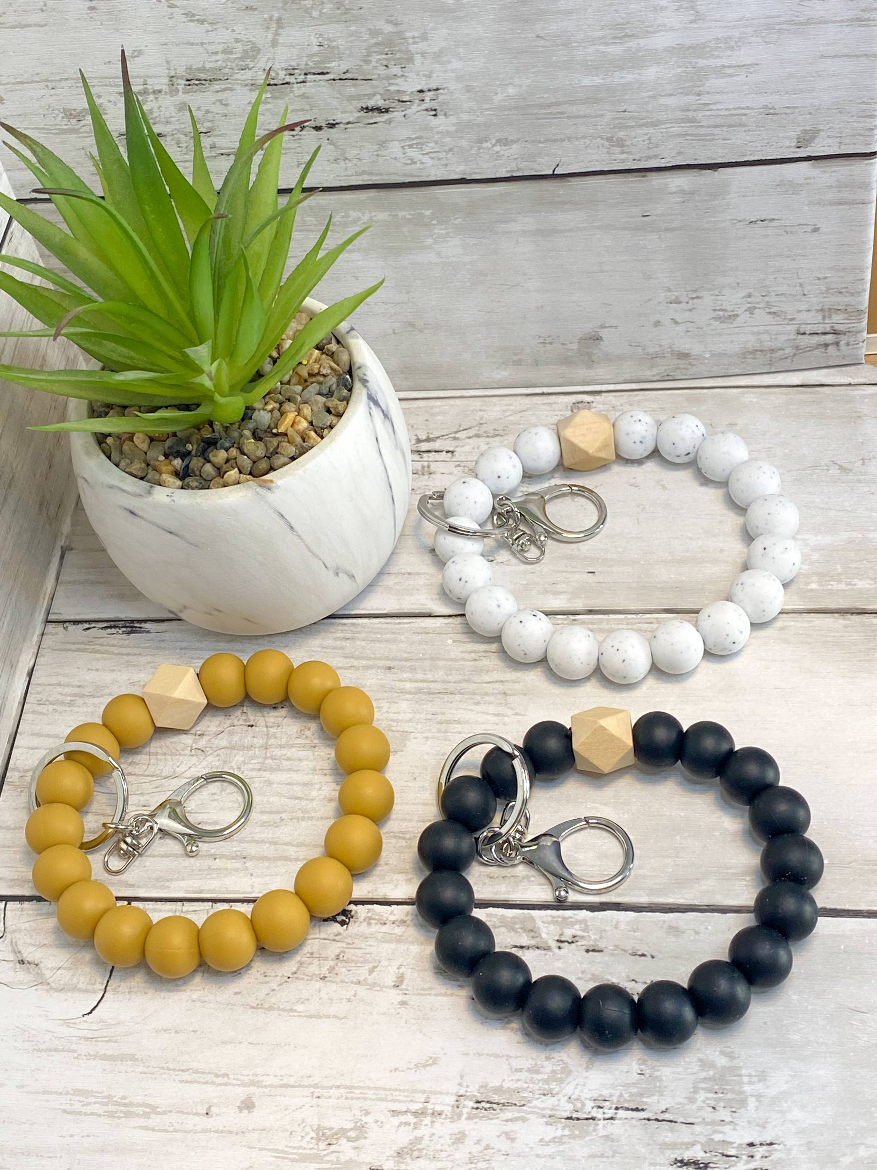 Wholesale Natural Toned Wristlet Key Rings for your store - Faire