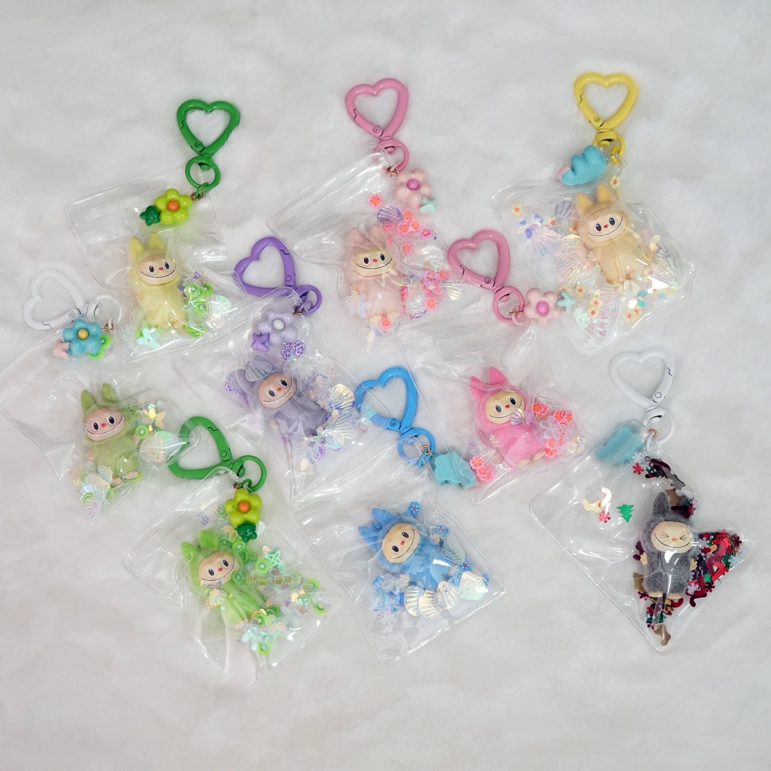 Wholesale Labubu Keychain - Pocket Pouch Collection for your store - Faire