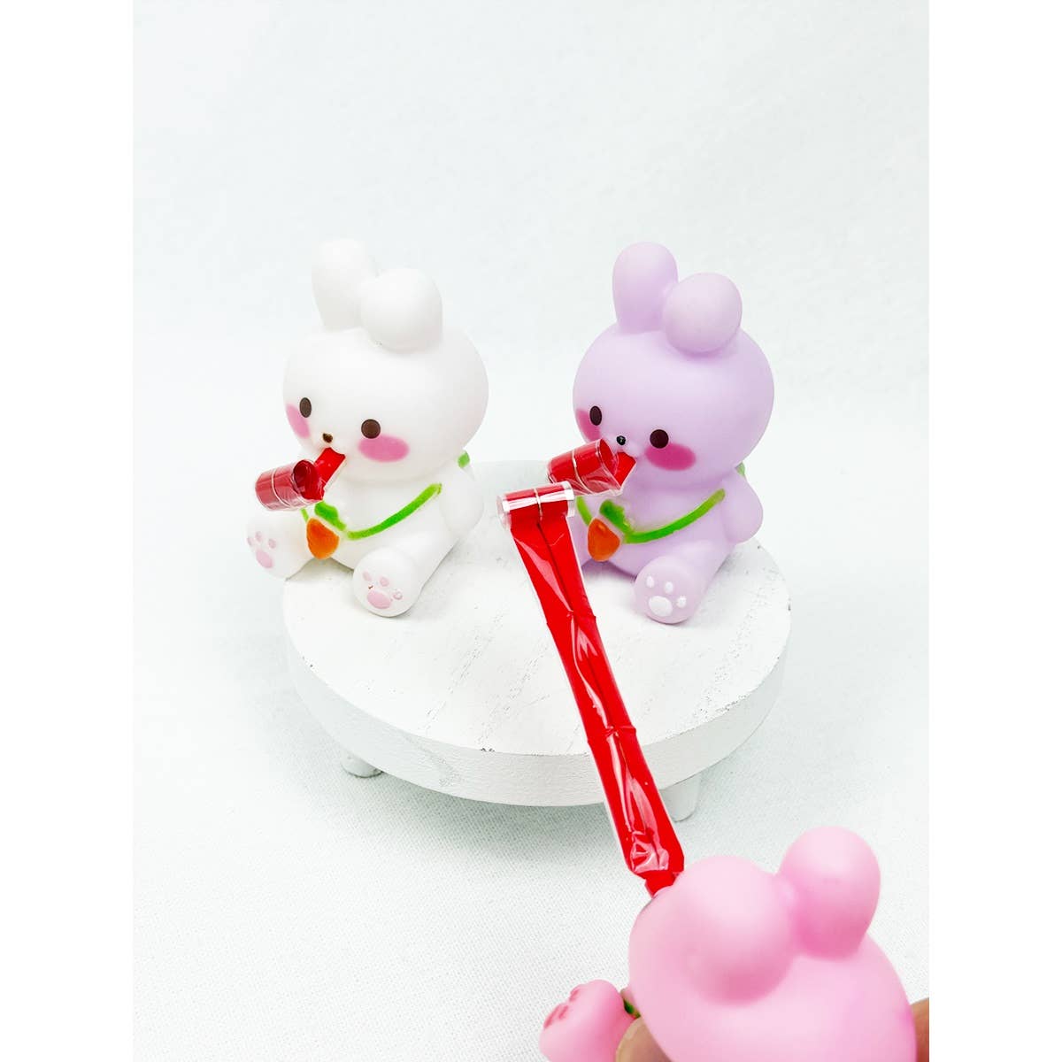 Wholesale Cute Bunny Roll Up Tongue Squeeze Toy for your store - Faire