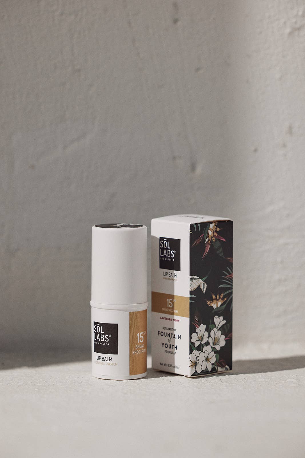 Wholesale SOL LABS® Hydrating Premium SPF 15 Lip Balm Lavender Mint for your store - Faire