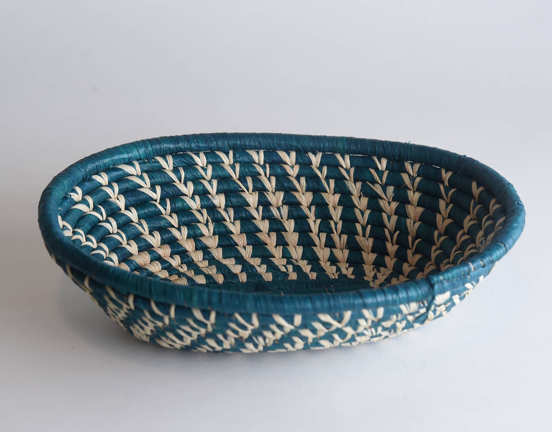 Wholesale Oval Raffia Baskets for your store - Faire