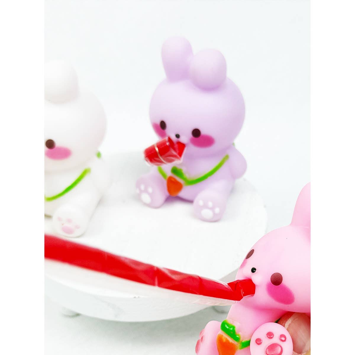 Wholesale Cute Bunny Roll Up Tongue Squeeze Toy for your store - Faire