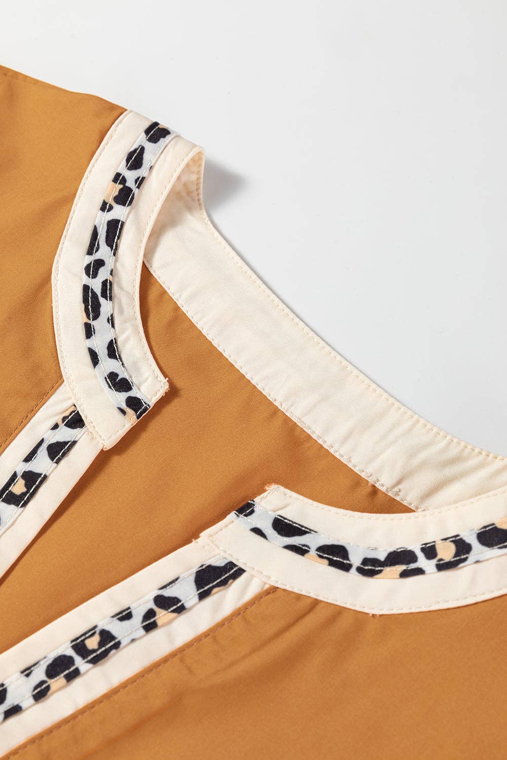 Wholesale Buckskin Contrast Leopard Trim Split Neck Puff Sleeve Blouse ...